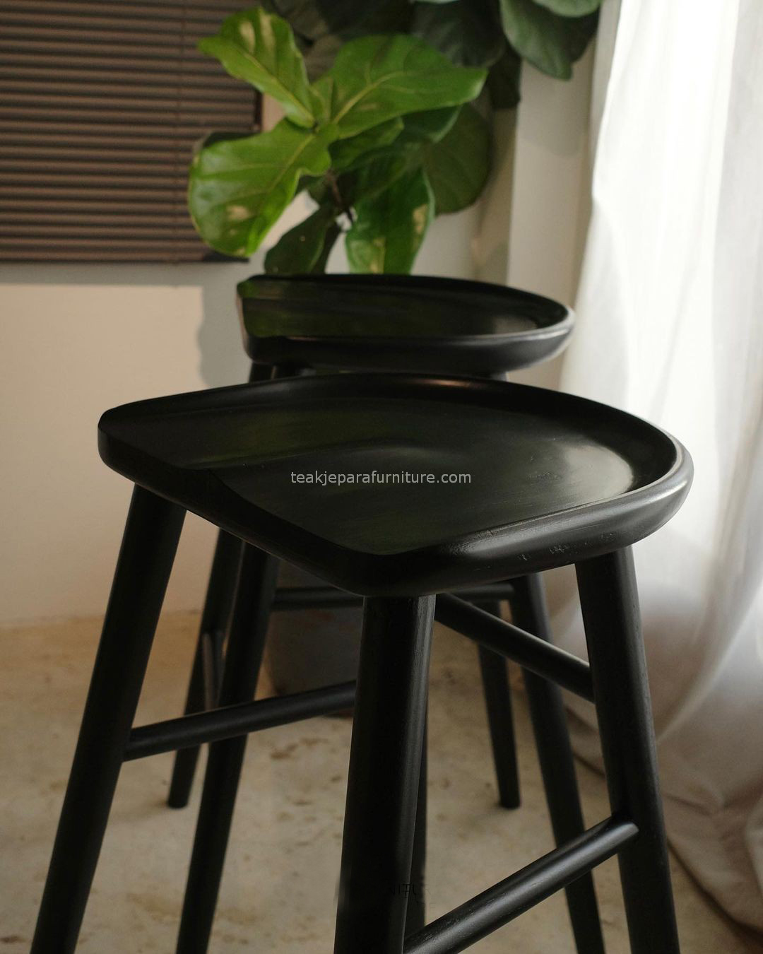 black wooden bar stools